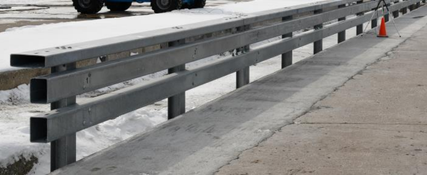 DEVELOPMENT OF A MASH TEST LEVEL 4 STEEL, SIDE-MOUNTED, BEAMAND-POST ...